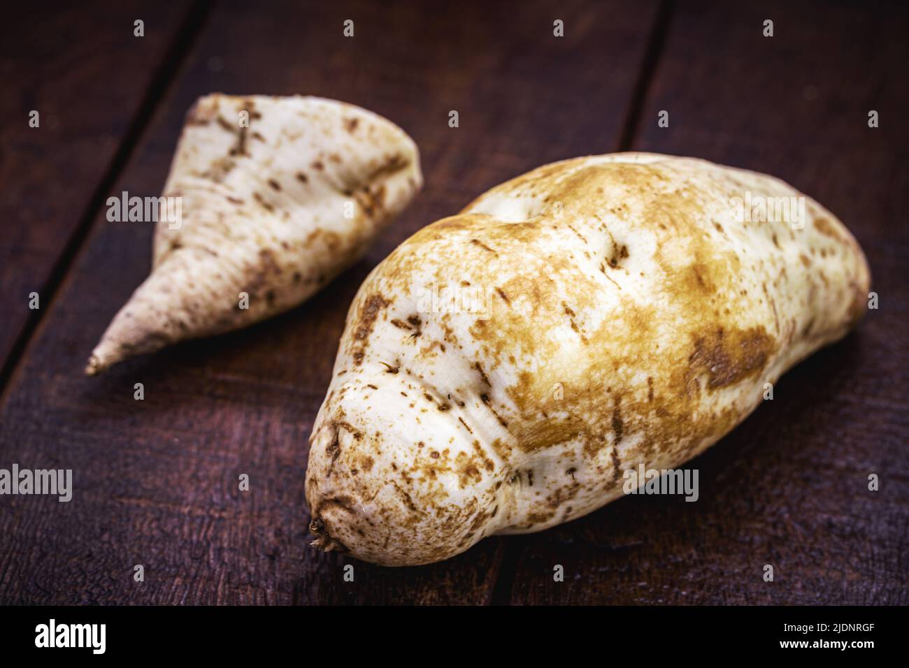 Brazilian sweet potato on rustic wooden table, tuber called potato from ...