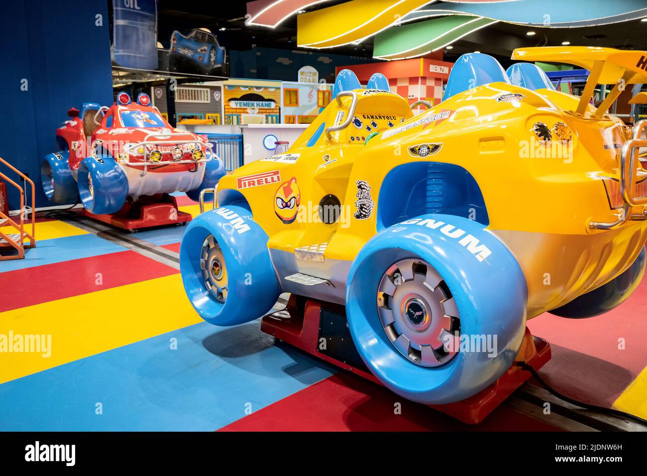 26 May 2022, Antalya, Turkey: Bright arcade attractions cars for ...