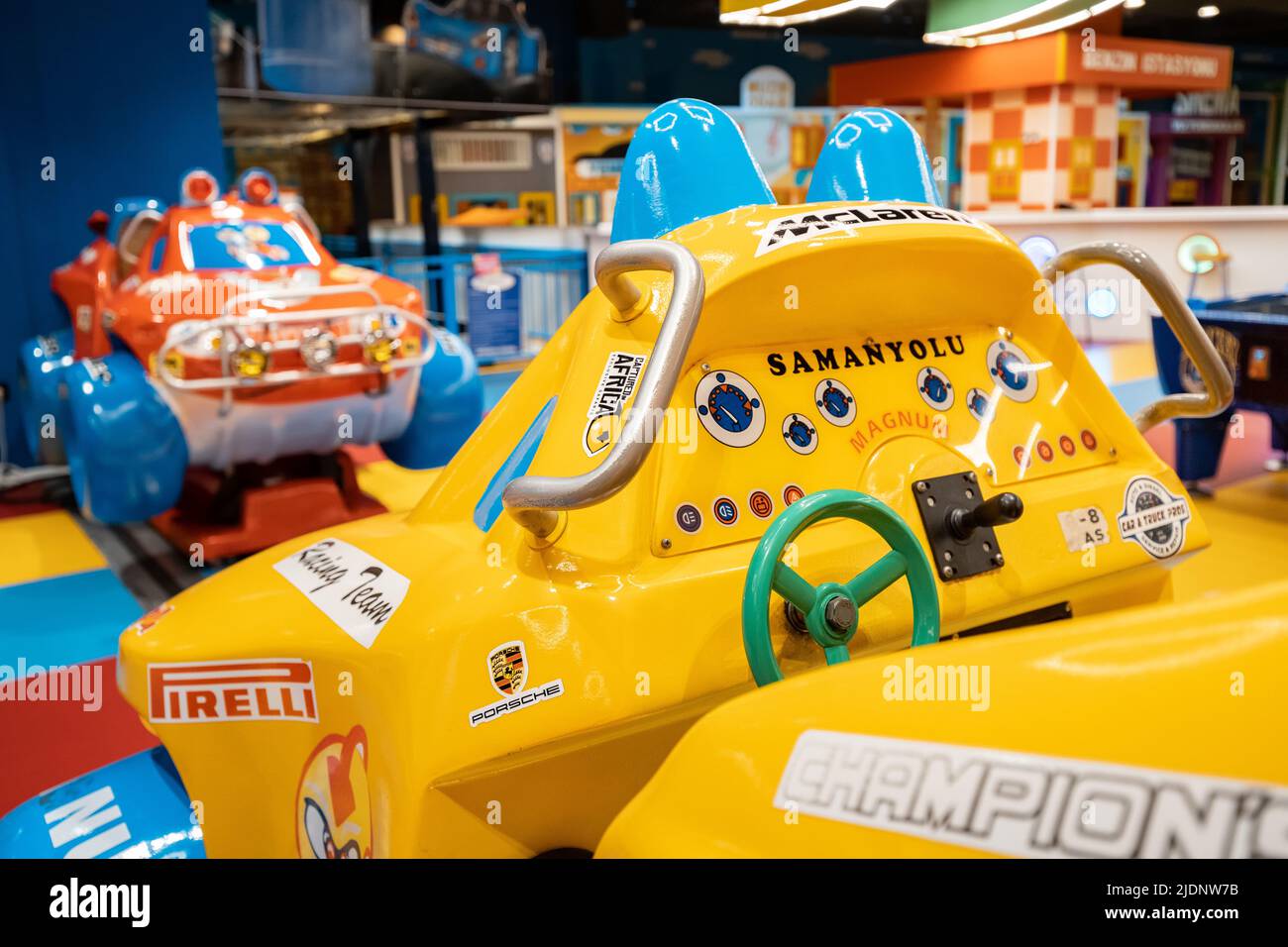26 May 2022, Antalya, Turkey: Bright arcade attractions cars for ...