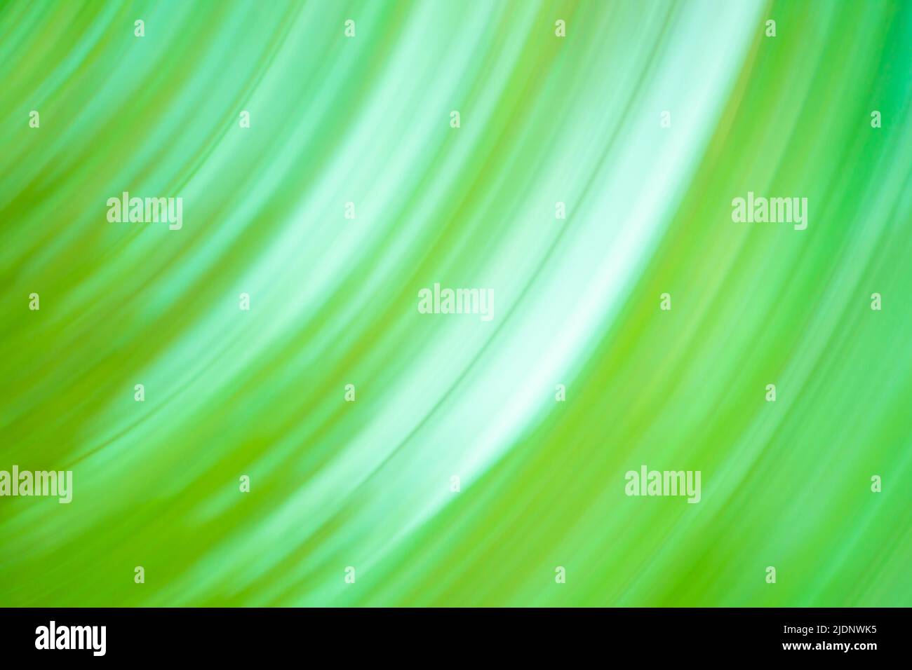 Slow shutter speed with motion green blur effect. Decorative green ...