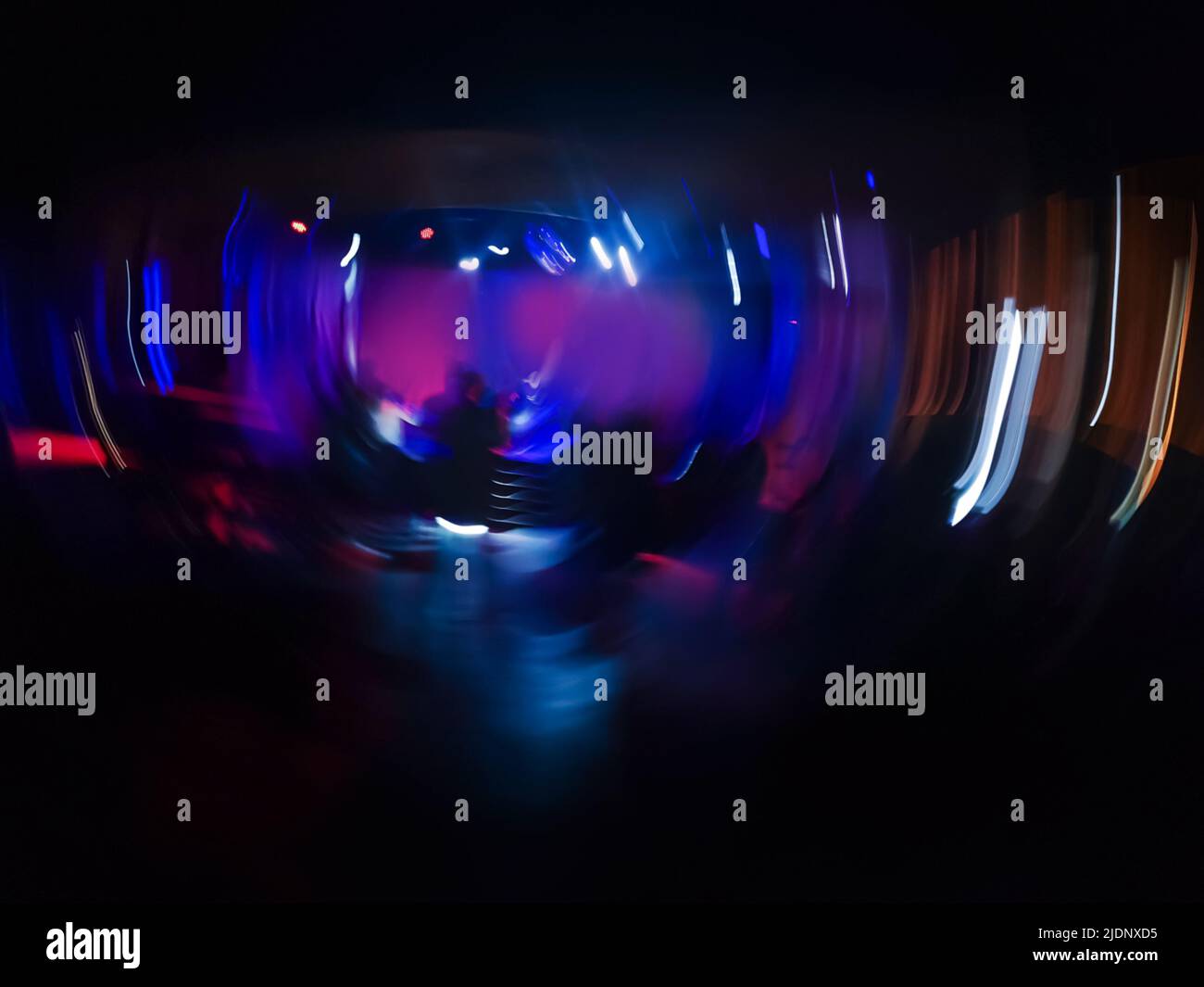 Group of happy friends having night party blur bokeh backdrop. Colorful ...