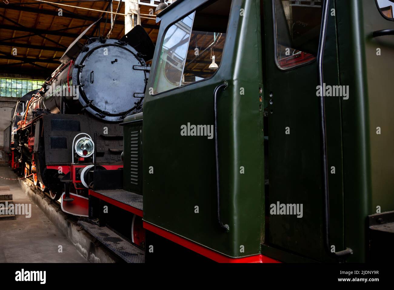 A steam locomotive standing in the building of the historic locomotive ...