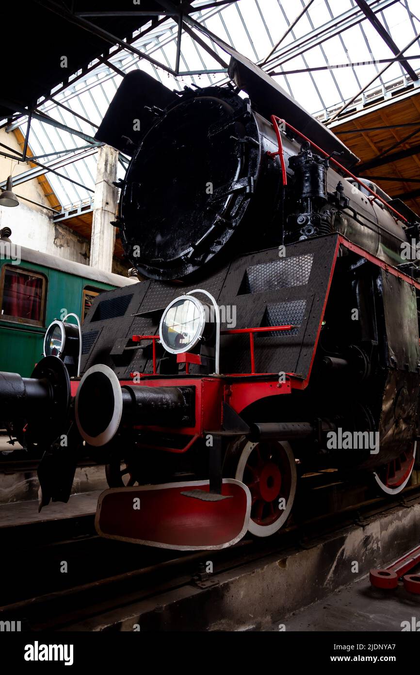 A steam locomotive standing in the building of the historic locomotive ...