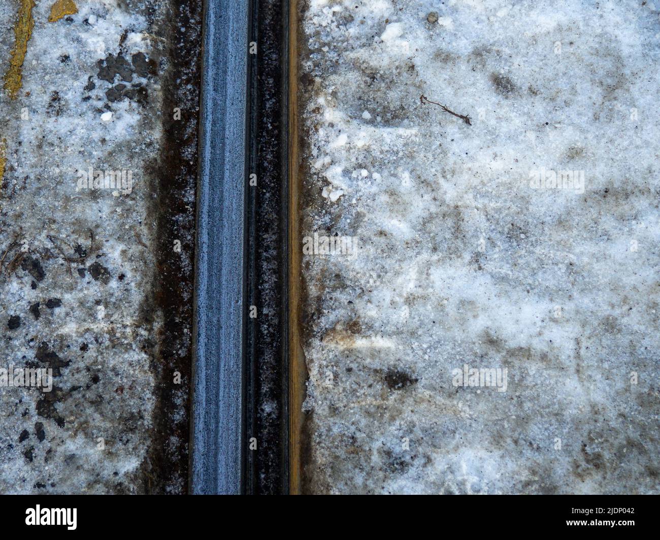 Rail in the snow. Tram track. Iron track Stock Photo - Alamy