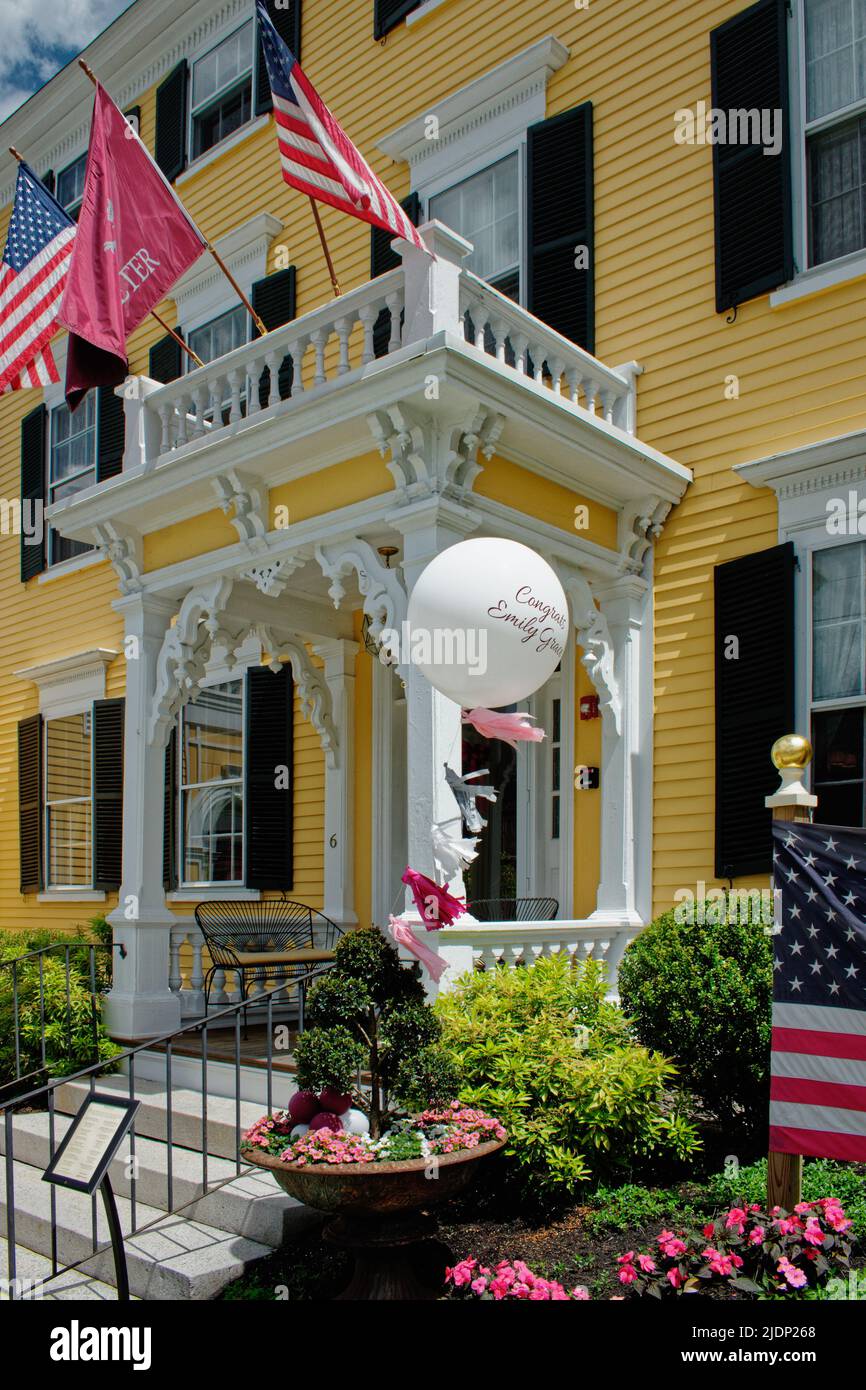Historic Inn by the Bandstand with balloons and flags on Front Street ...