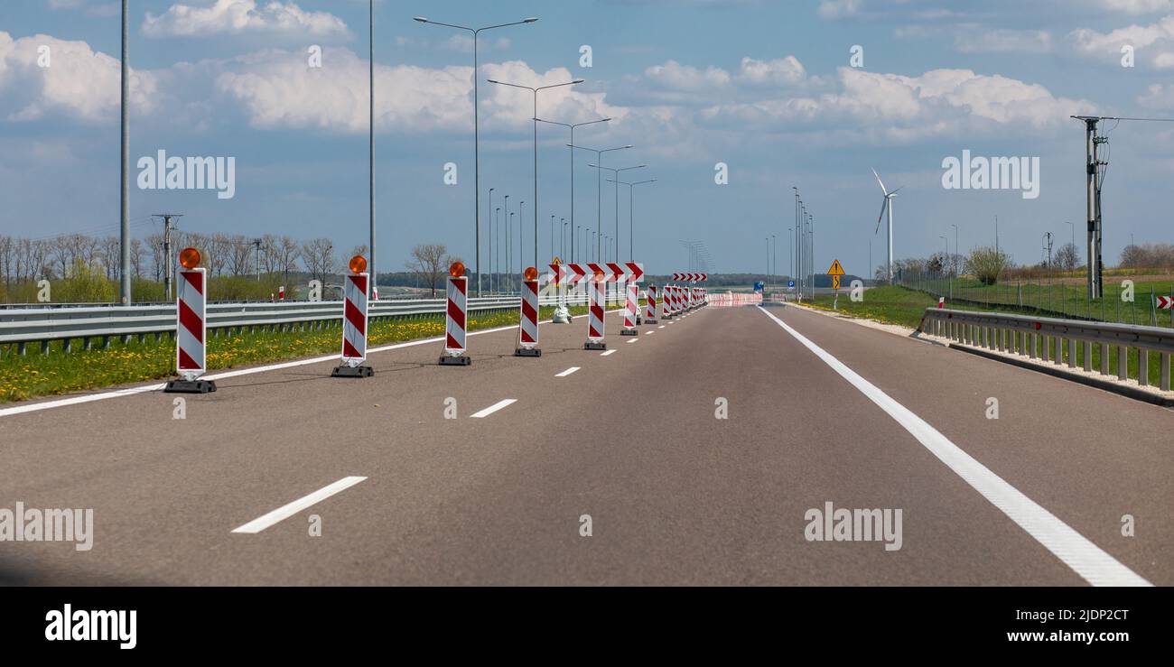 Highway repair reconstruction works and road narrowing Stock Photo - Alamy