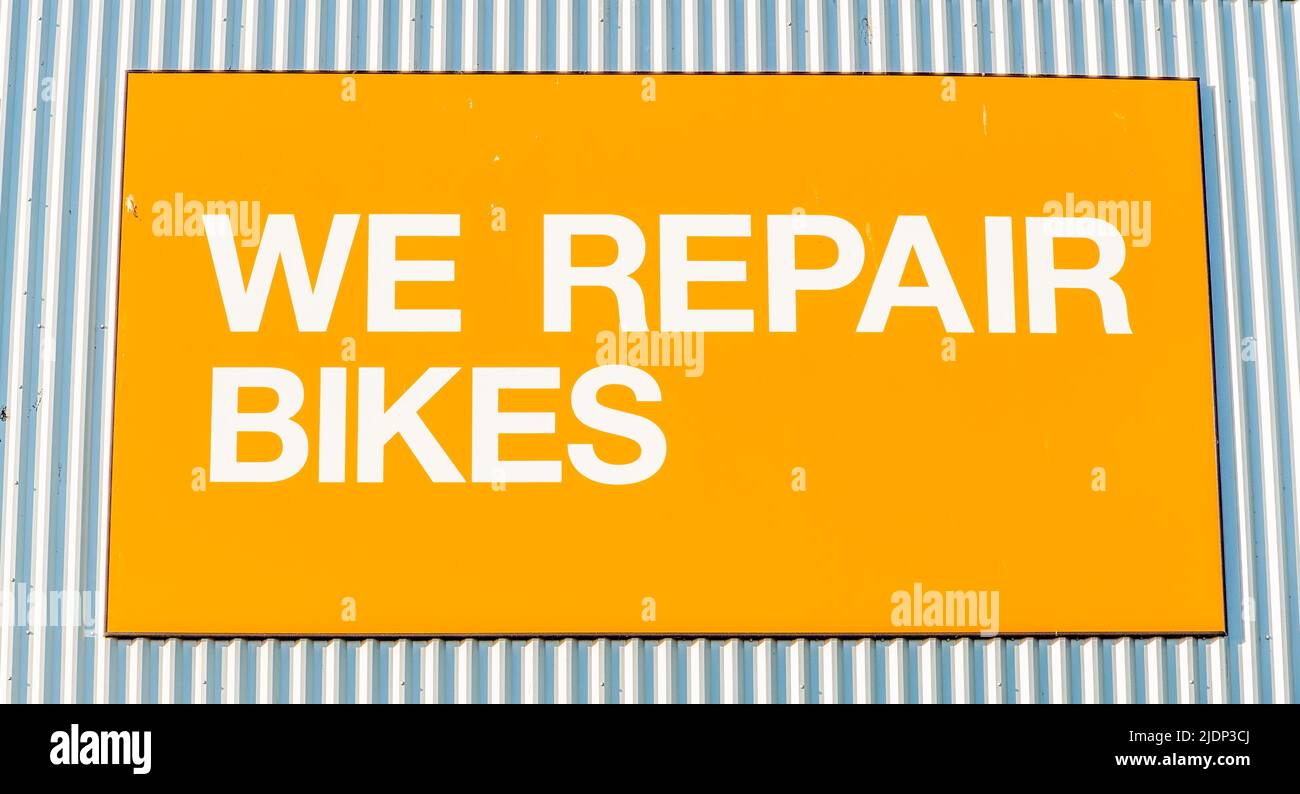 Halfords sign with information for their business, Edinburgh, Scotland ...