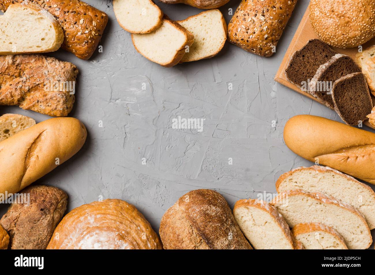 Homemade natural breads. Different kinds of fresh bread as background ...