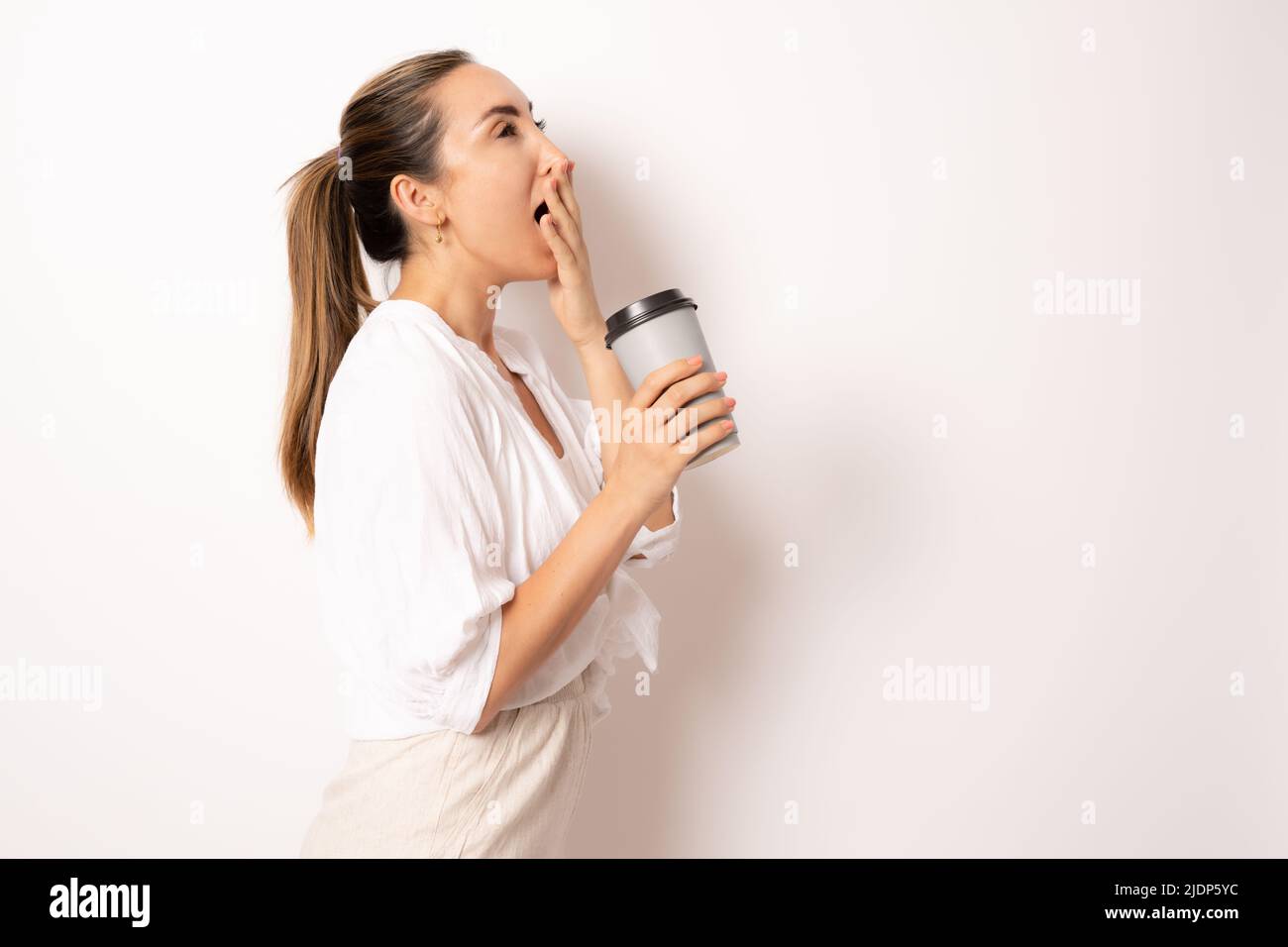 Image of young secretary tired woman wearing white casual shirt ...