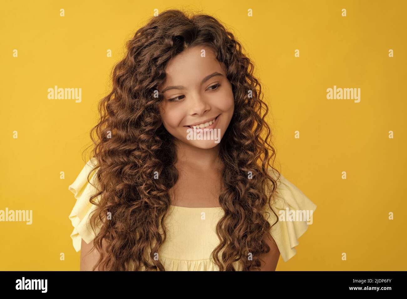 happy teen girl with long curly hair and perfect skin, hair Stock Photo ...