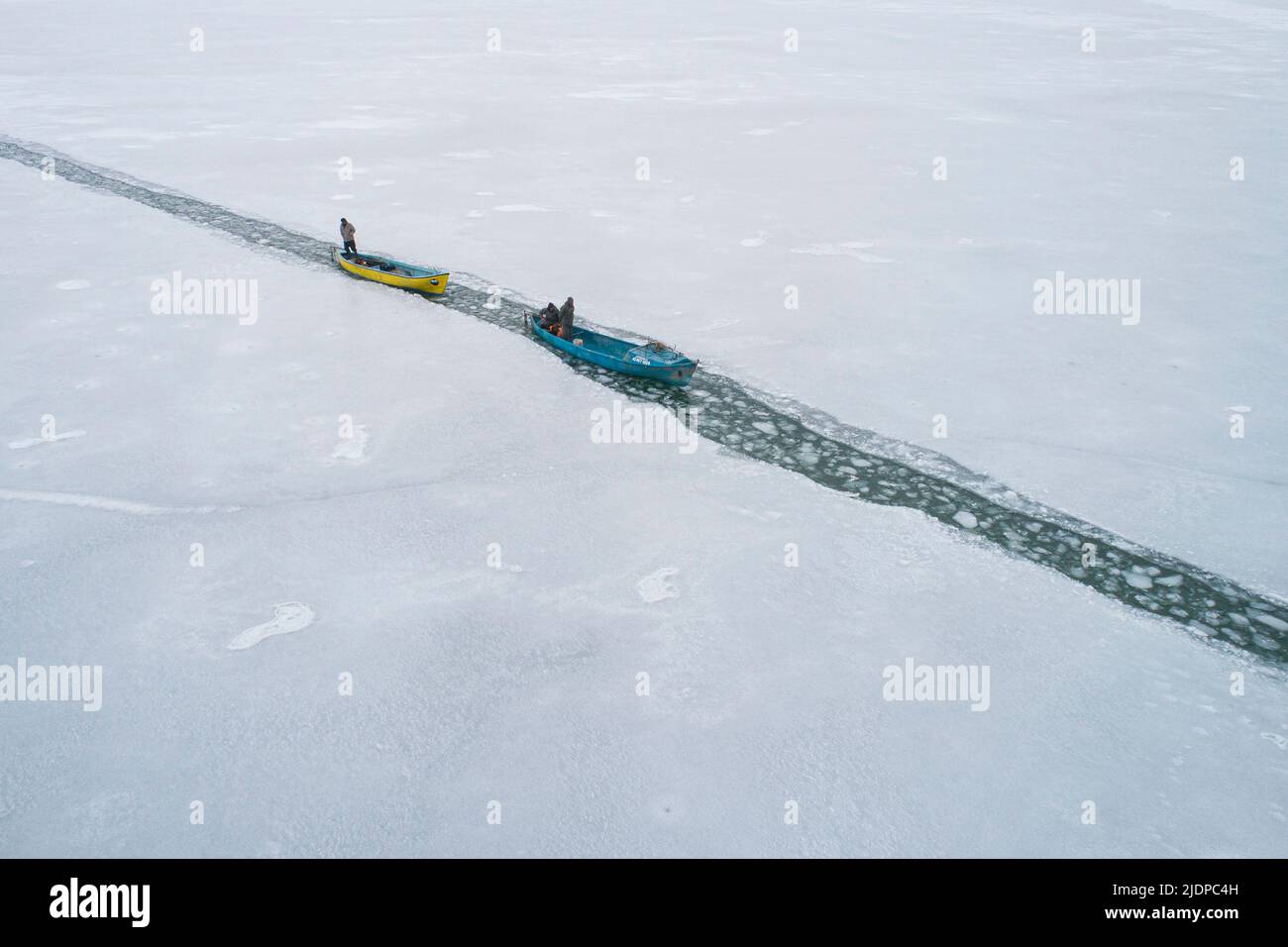 Cracking Ice Expedition Boat Exploration on a Shattered Ice Sheet Stock ...