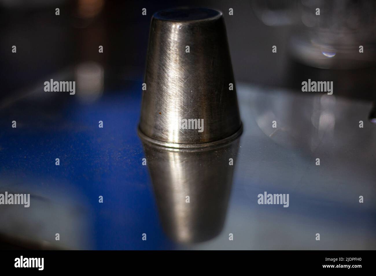 A stack for alcohol made of metal. Abstract background of metal and ...