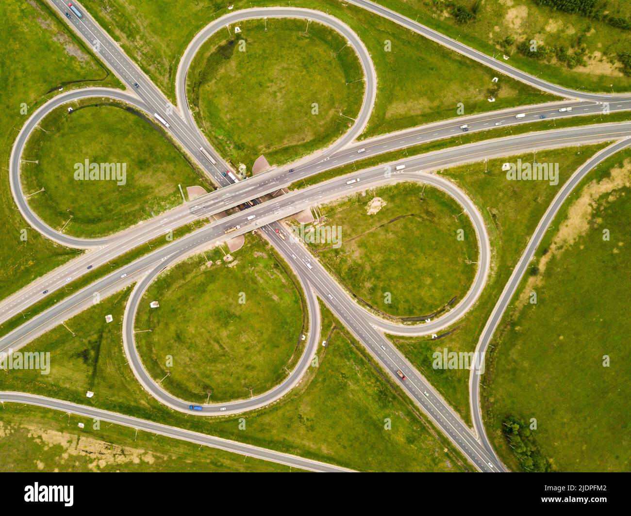 Top view of green roundabout Stock Photo - Alamy