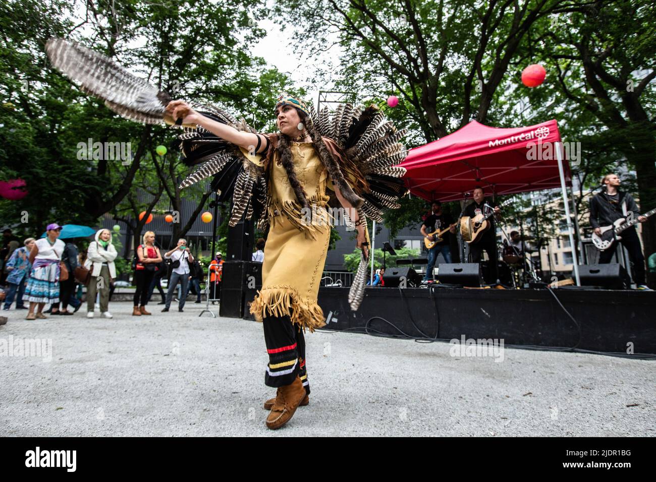 Montreal, Canada. 21st June, 2022. An Indigenous dancer shows a ...