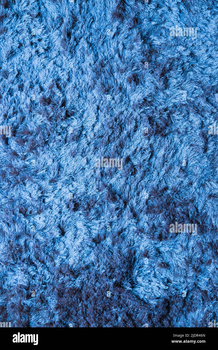 Blue fabric carpet with long pile texture background Stock Photo - Alamy