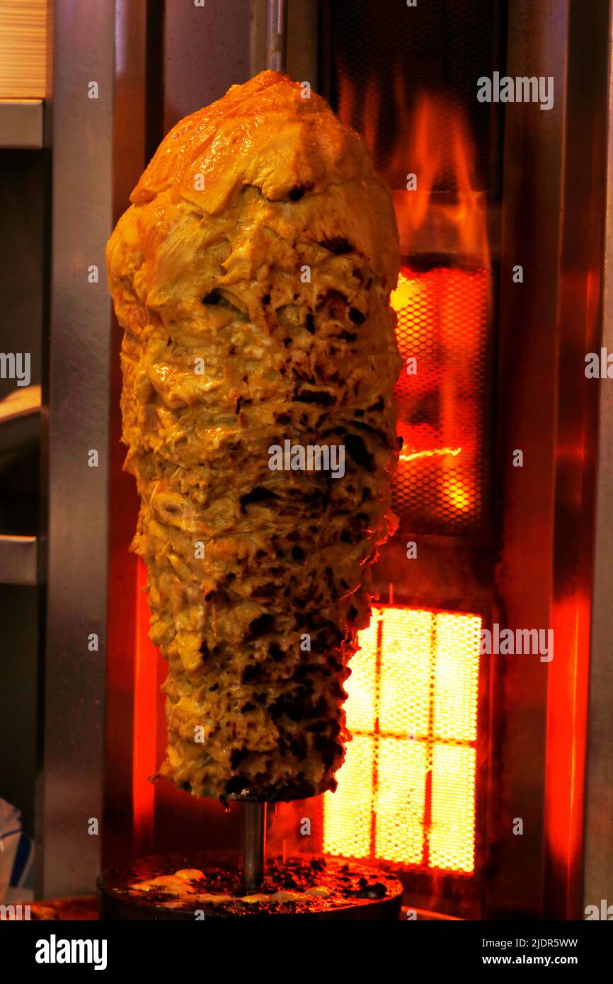 Arabic lebanese food speciality, pile of chicken shawarma preparation ...