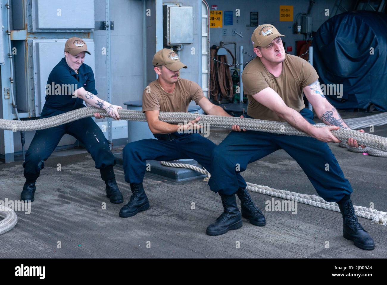 Santa Rita, Guam. 22nd June, 2022. Sailors haul in line on the fantail ...