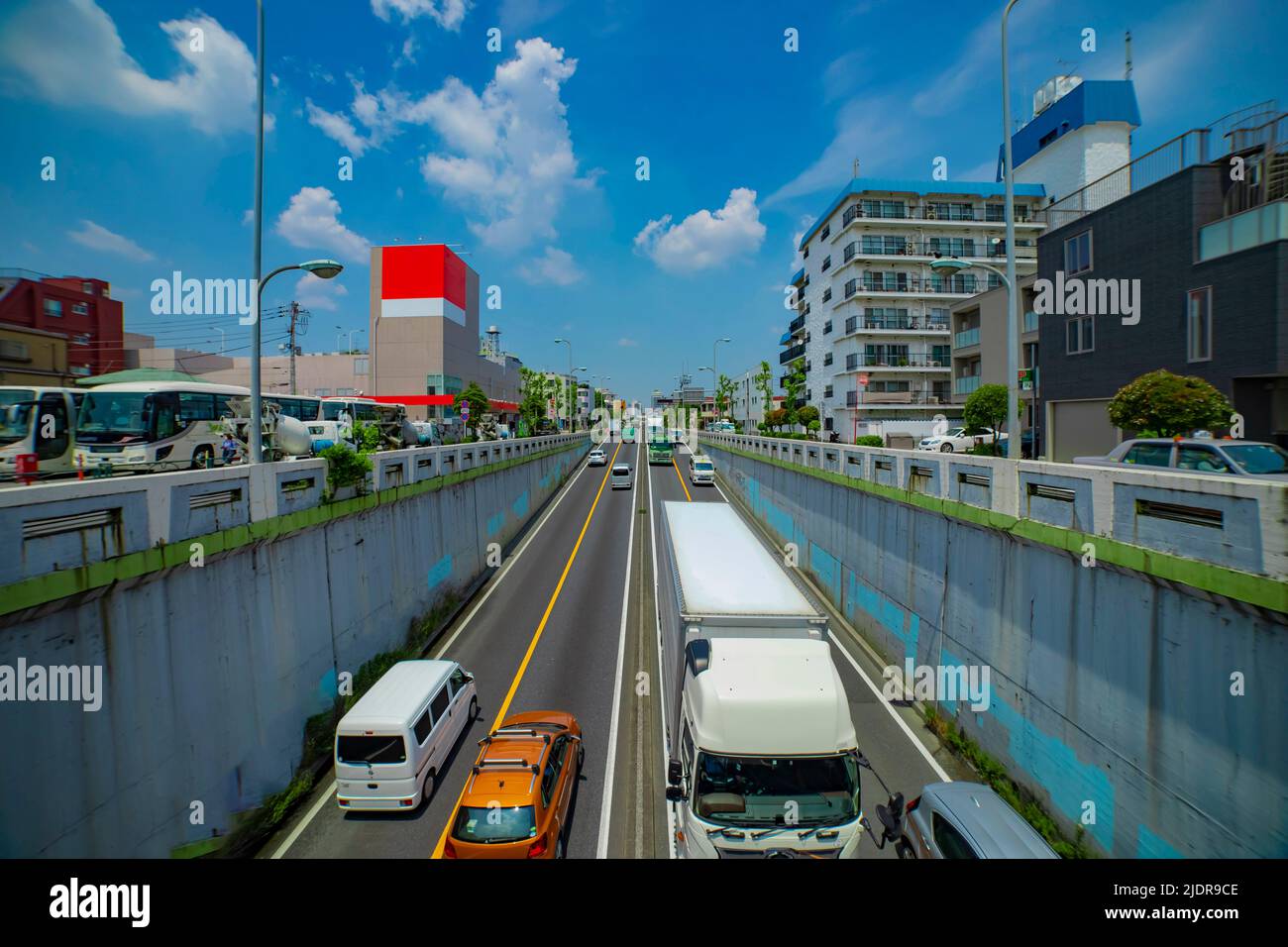 A traffic jam at the urban street in Tokyo wide shot Stock Photo - Alamy