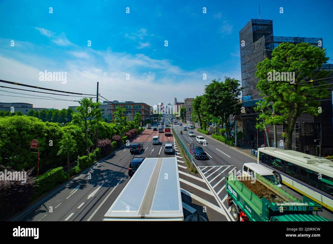A traffic jam at the urban street in Tokyo wide shot Stock Photo - Alamy