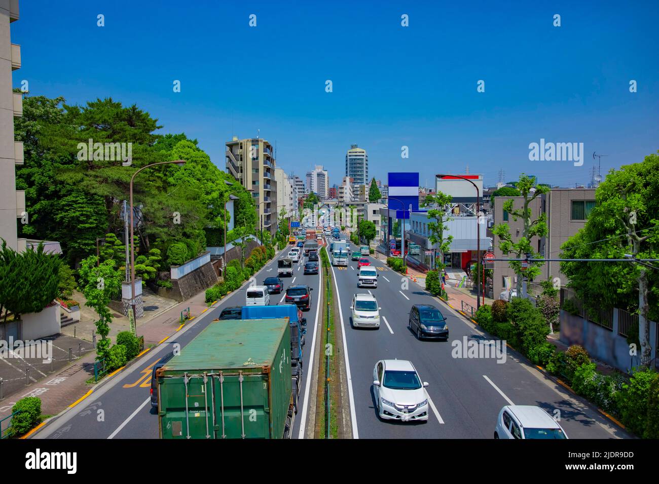 A traffic jam at the urban street in Tokyo wide shot Stock Photo - Alamy