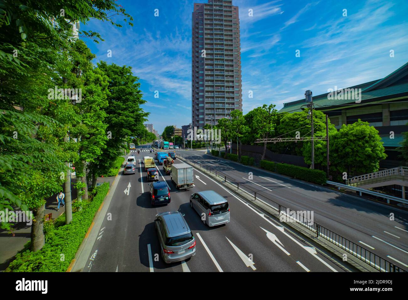 A traffic jam at the urban street in Tokyo wide shot Stock Photo - Alamy