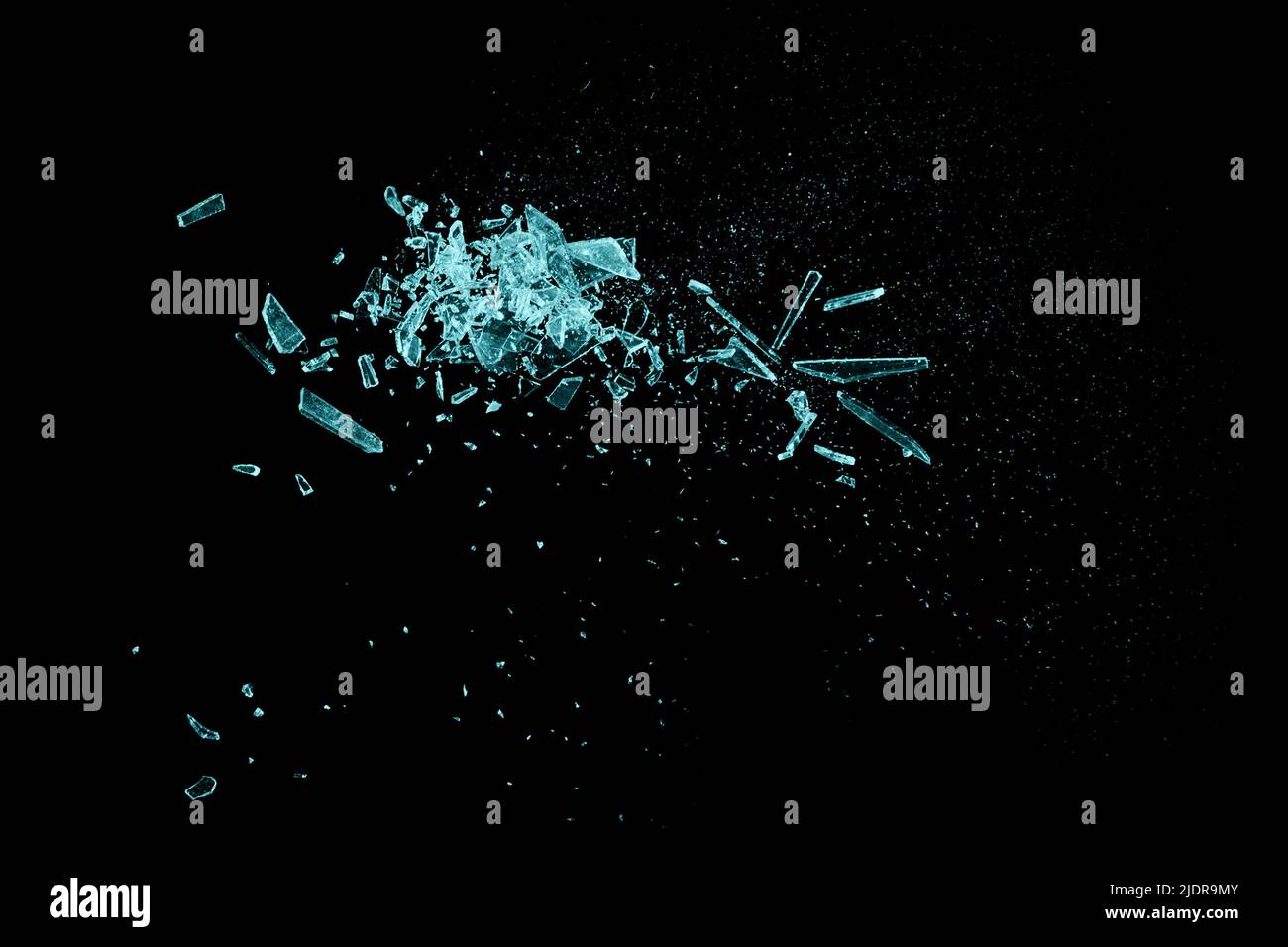 Small pieces of broken blue glass isolated on black background. Texture ...