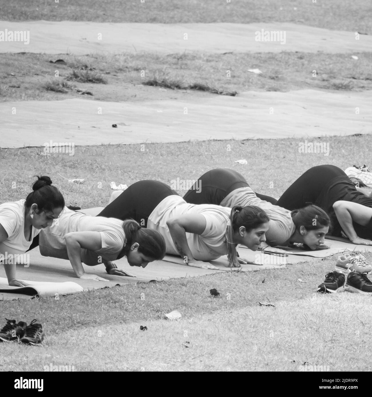 Group meditation outdoors Black and White Stock Photos & Images - Alamy