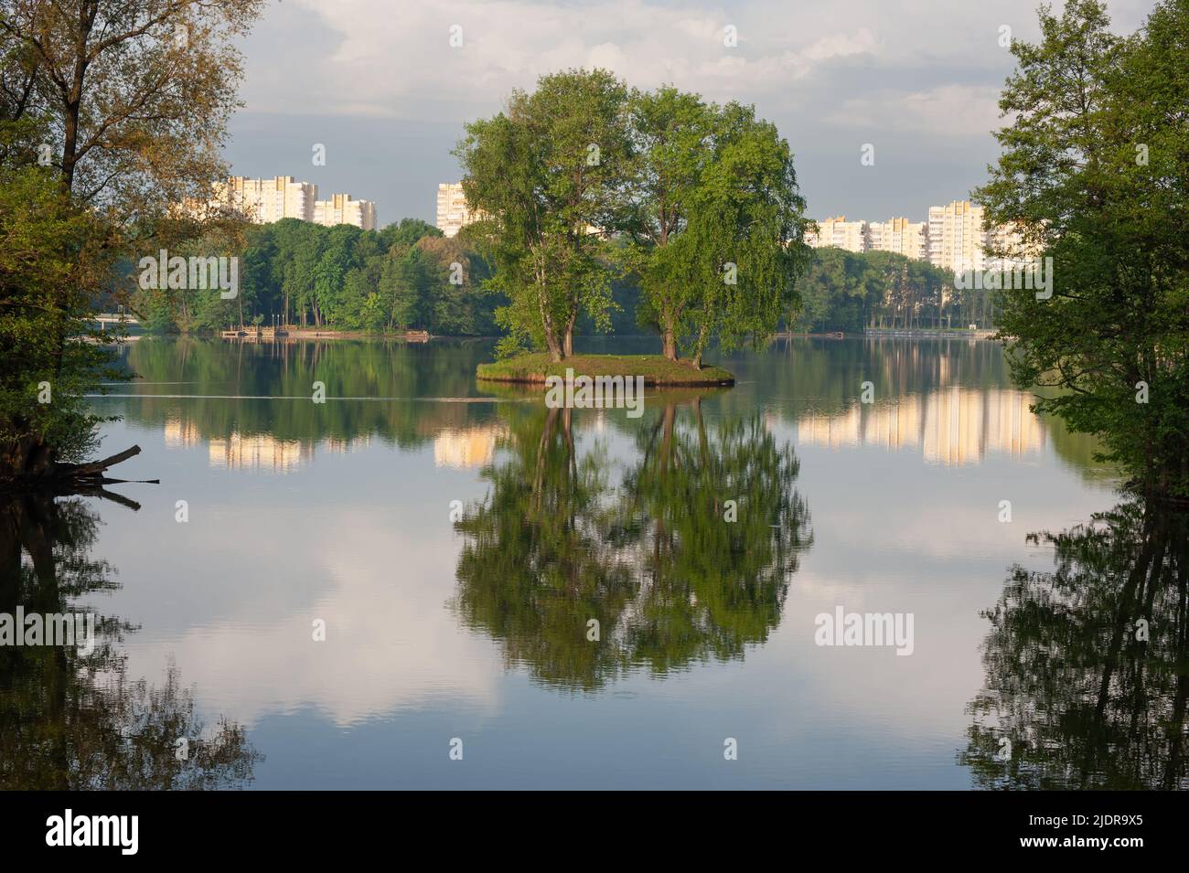 Landscape with a lake in the early morning in the city park of Minsk ...