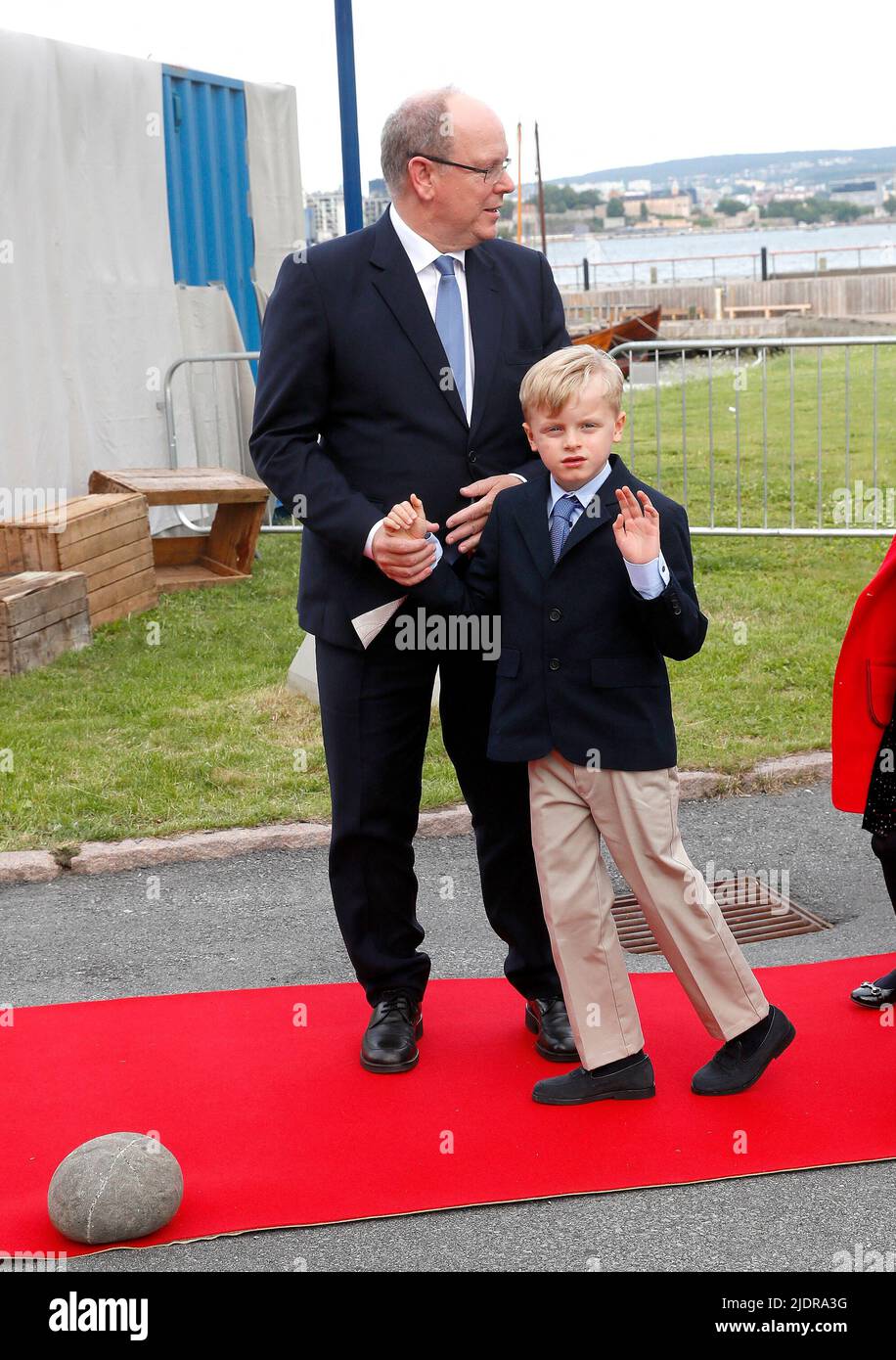 Prince Albert II of Monaco and his son Jacques attend the opening of ...