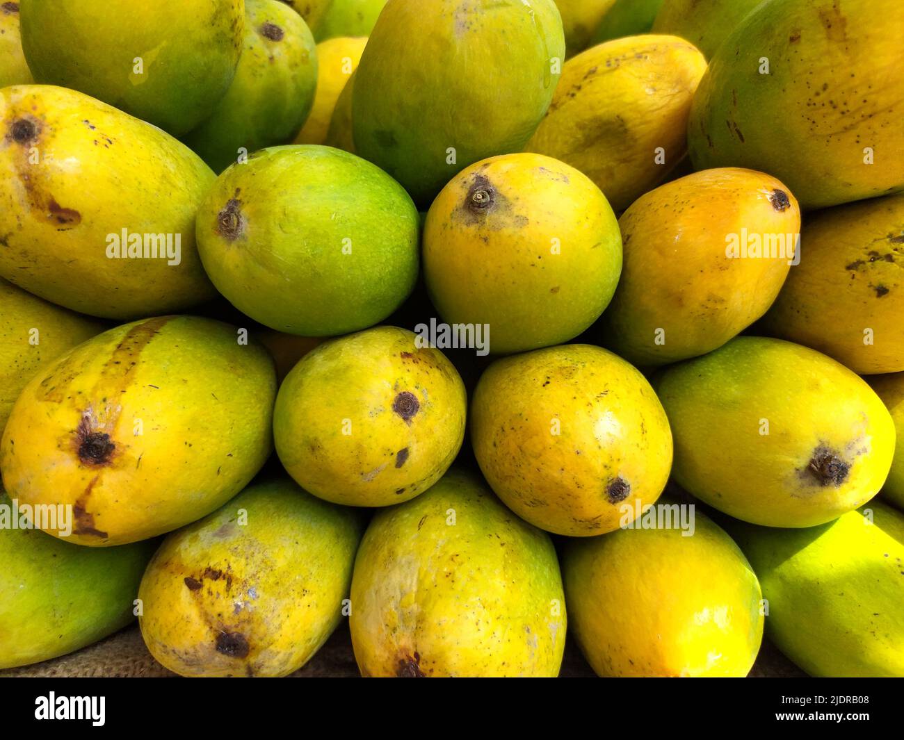 some fresh healthy sweet fruits put on a fruits shop Stock Photo - Alamy