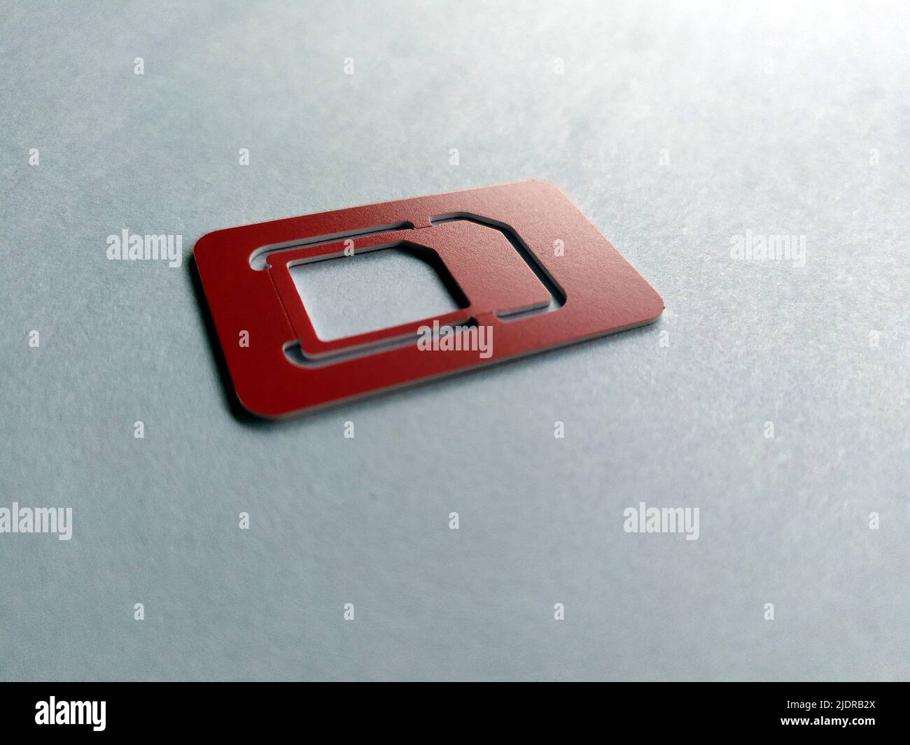 SIM Card, phone and slot on the white background, copy space, top view ...