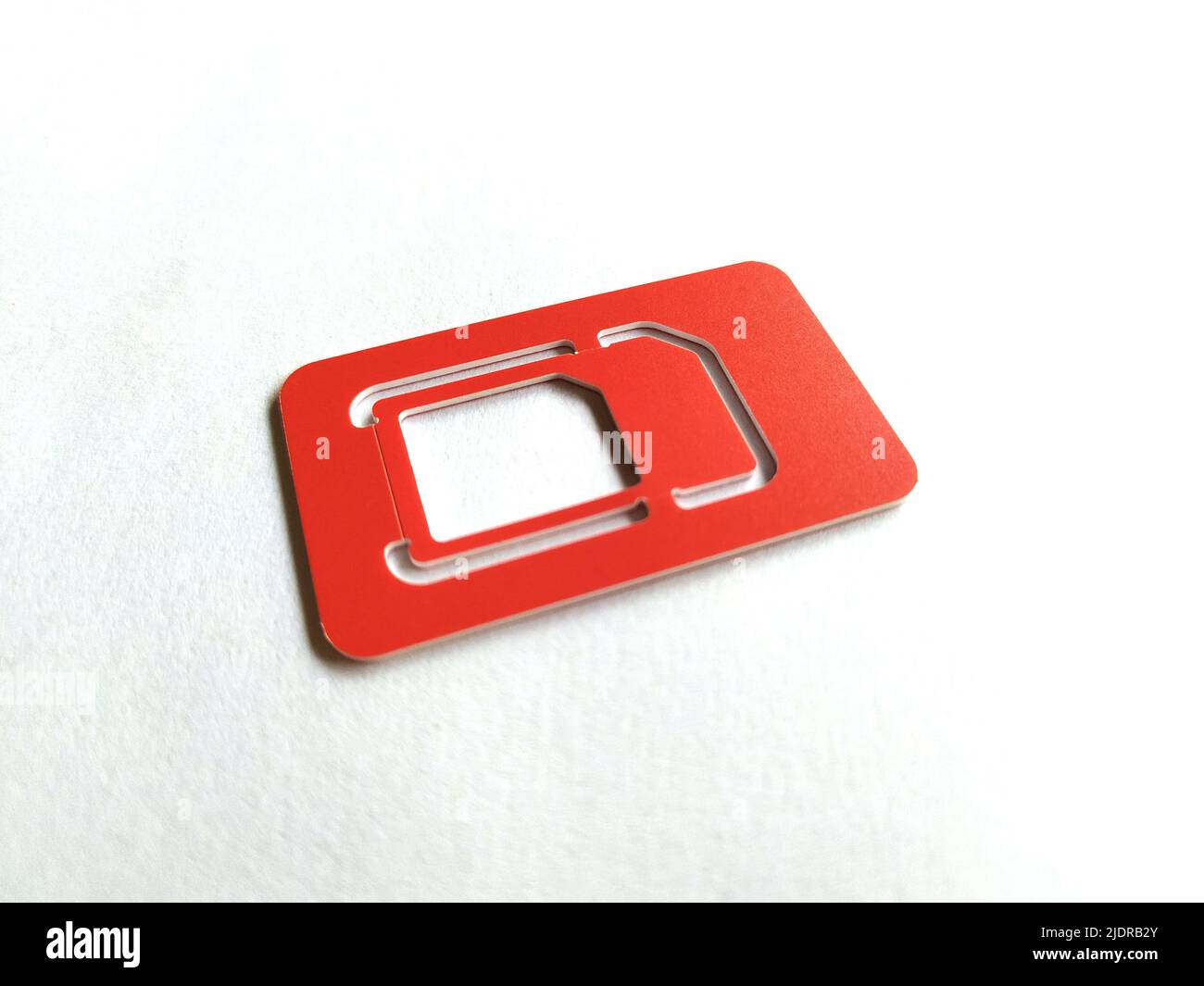 SIM Card, phone and slot on the white background, copy space, top view ...