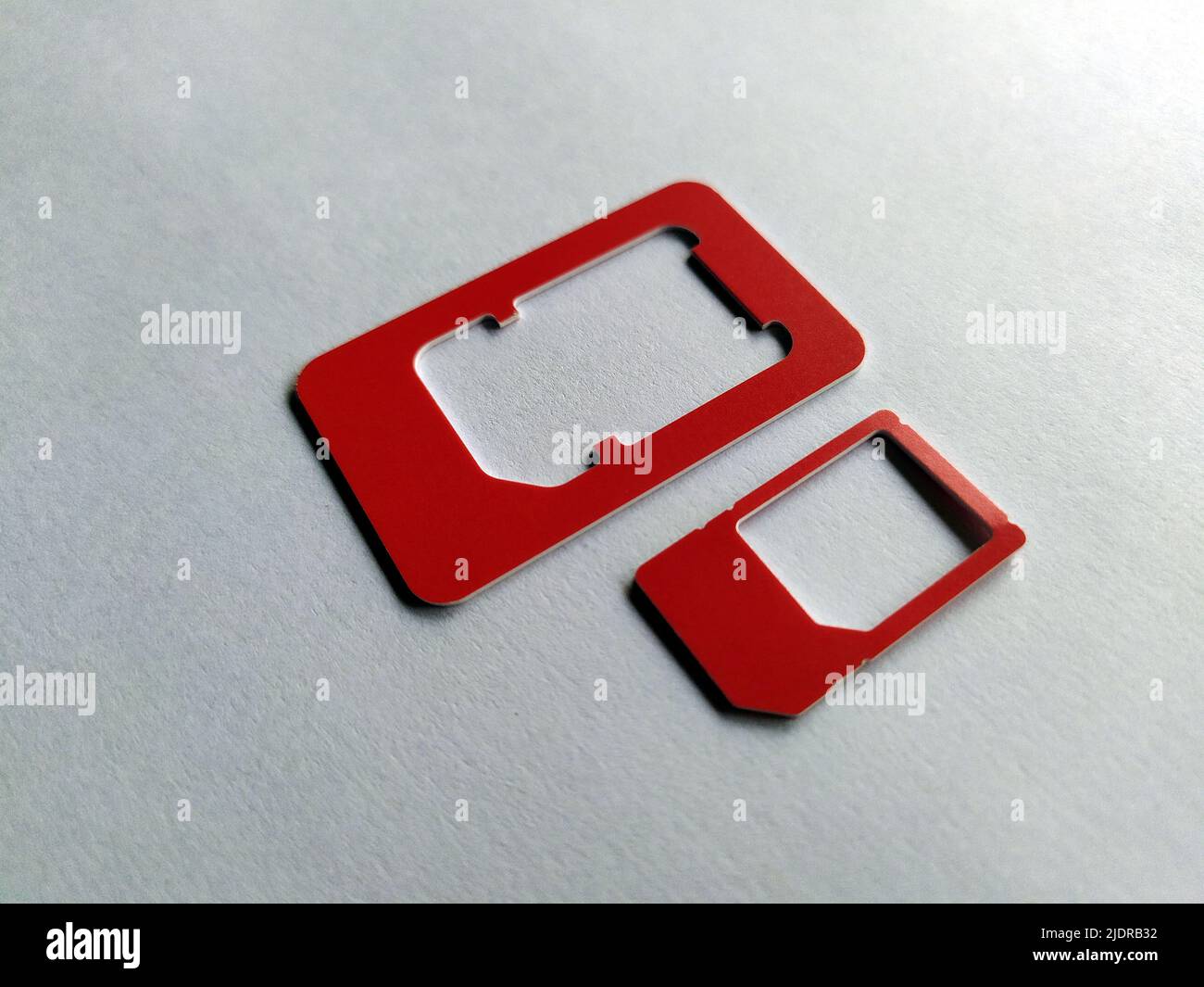 SIM Card, phone and slot on the white background, copy space, top view ...