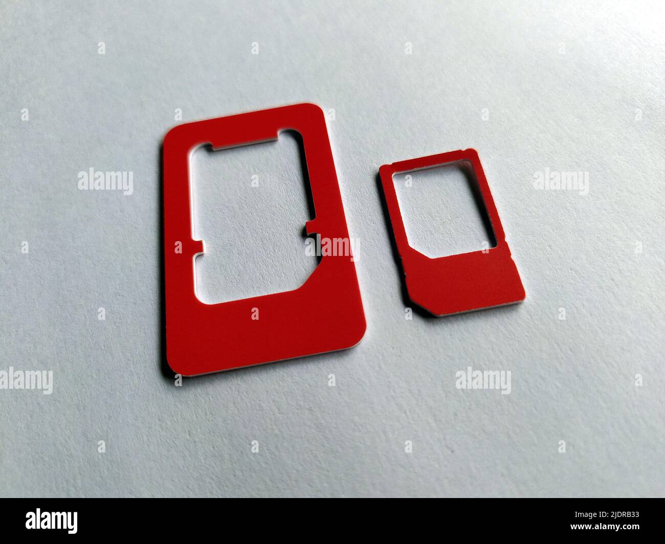 SIM Card, phone and slot on the white background, copy space, top view ...