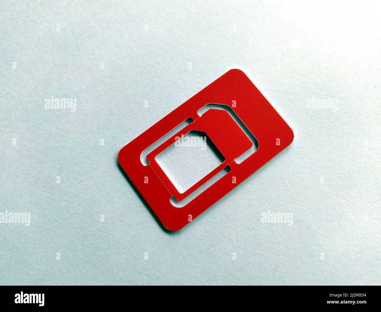 SIM Card, phone and slot on the white background, copy space, top view ...