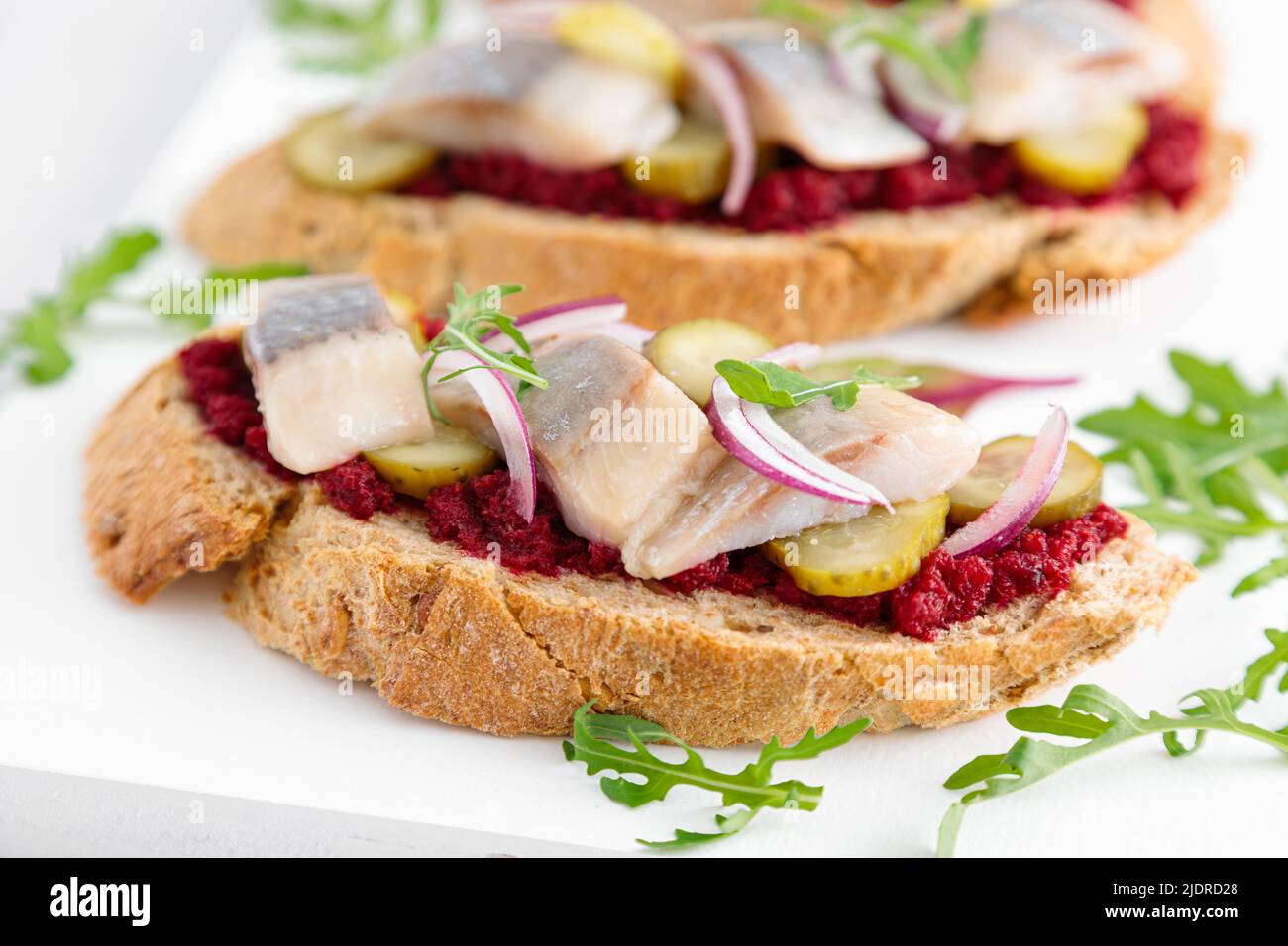 Sandwiches, toasts with salted herring and beetroot pate Stock Photo ...