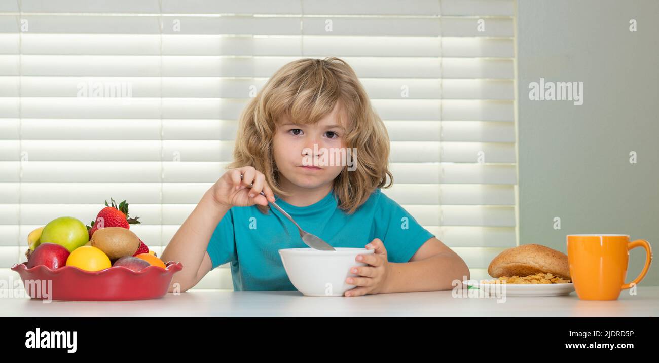 Child boy eating organic healthy food. Healthy vegetables with vitamins ...