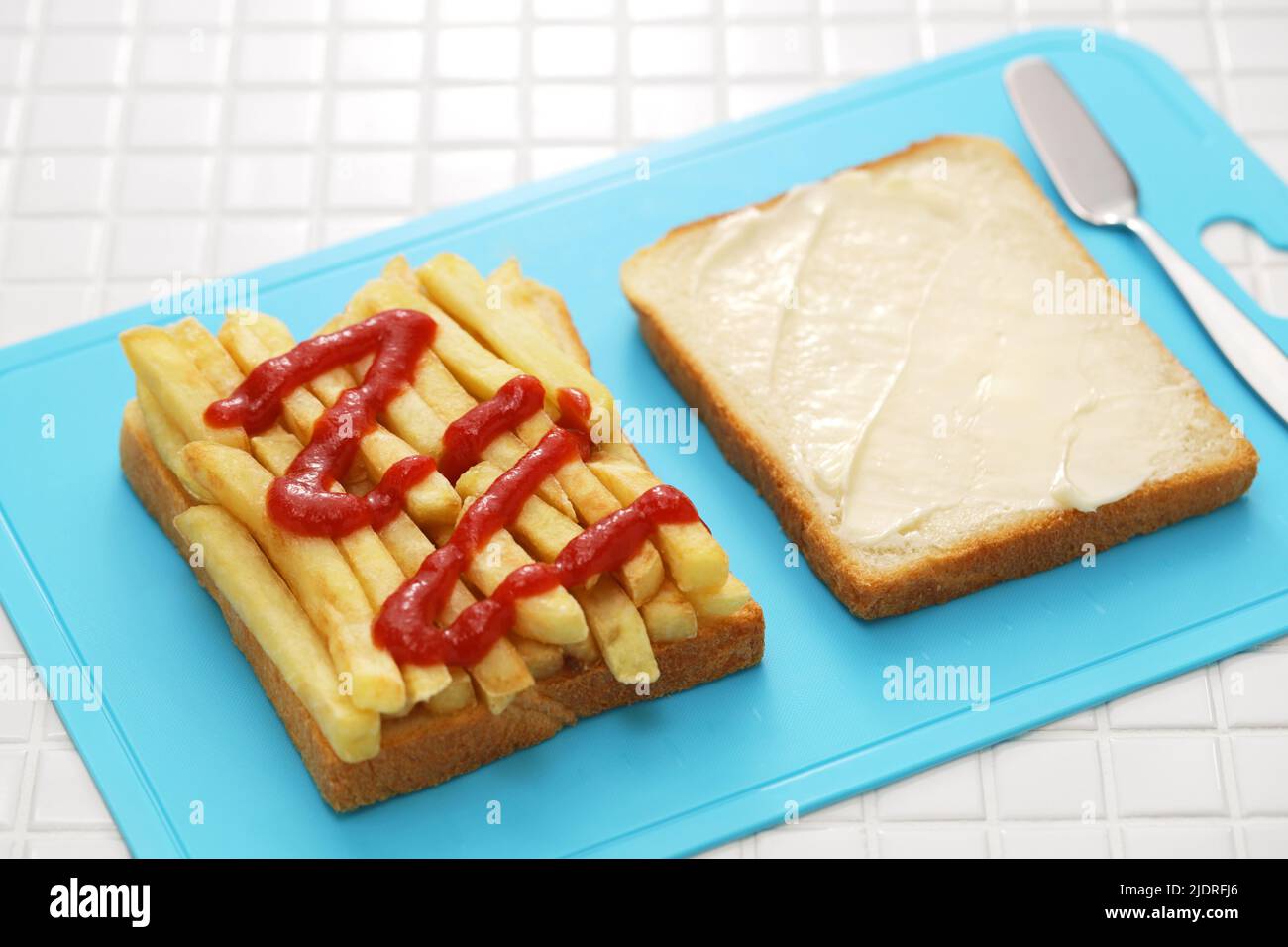 chip butty (french fry sandwich), British food Stock Photo - Alamy