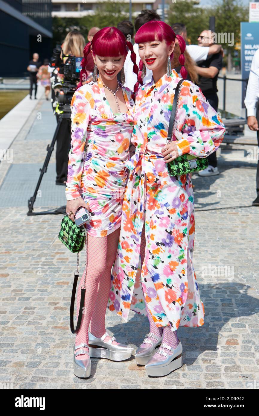 MILAN, ITALY - JUNE 18, 2022: Amiaya, Ami and Aya Suzuki with floral ...