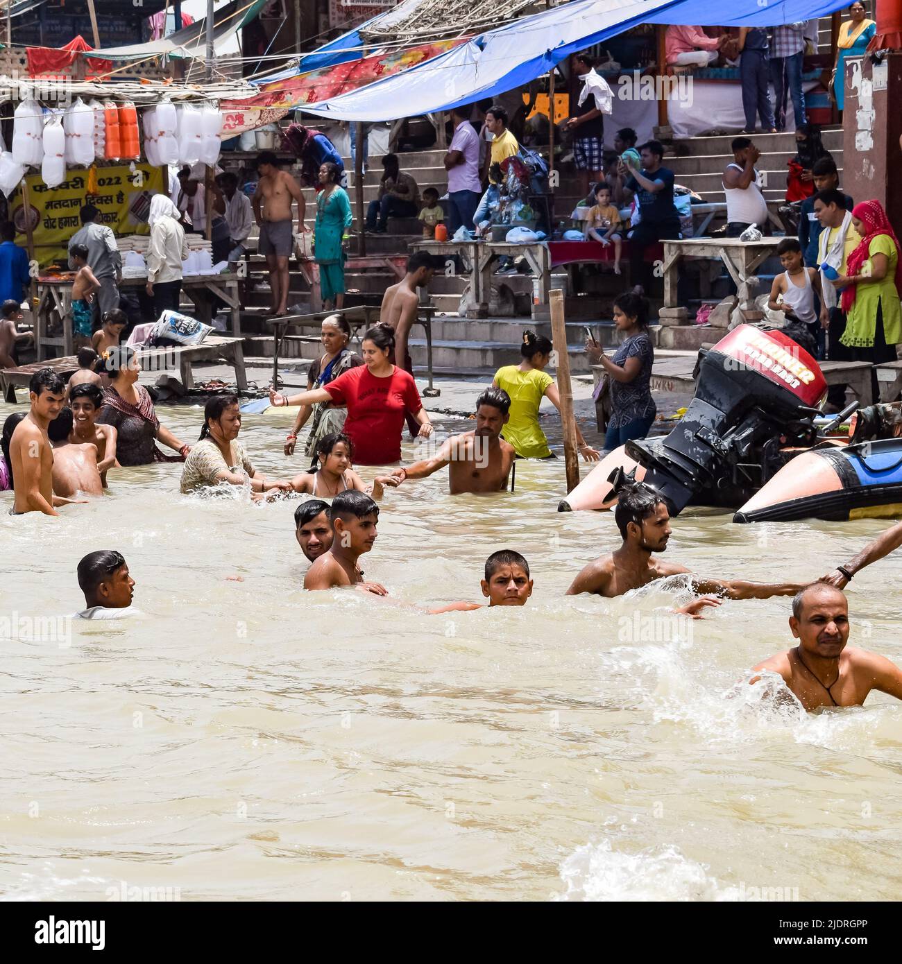 Pilgrims taking holy dip bath hi-res stock photography and images - Alamy