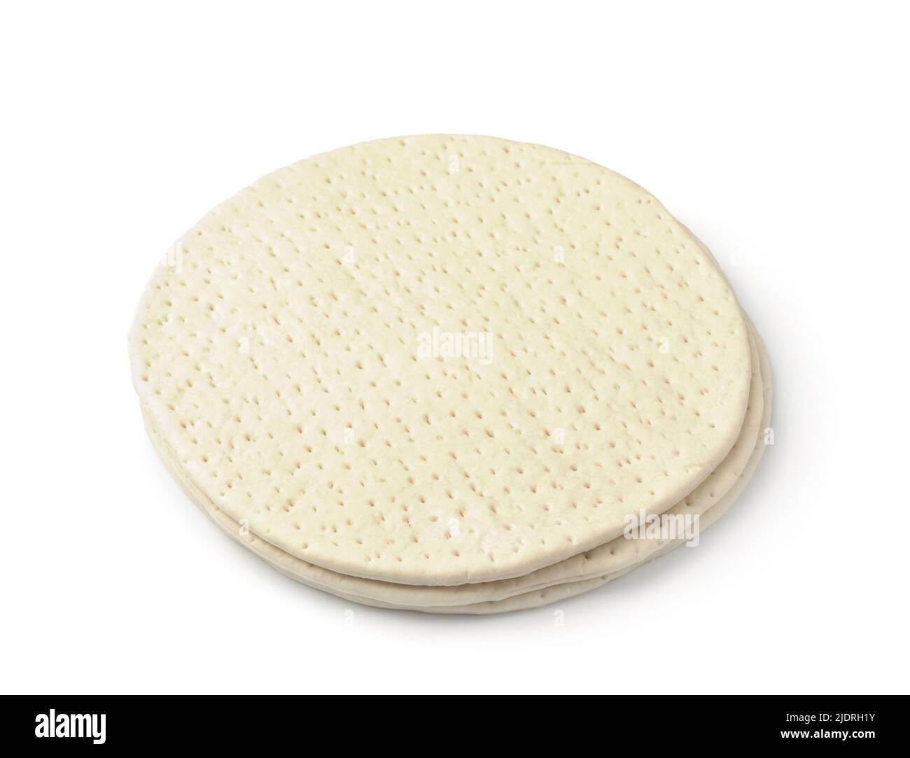 Three uncooked frozen pizza dough bases isolated on white Stock Photo ...