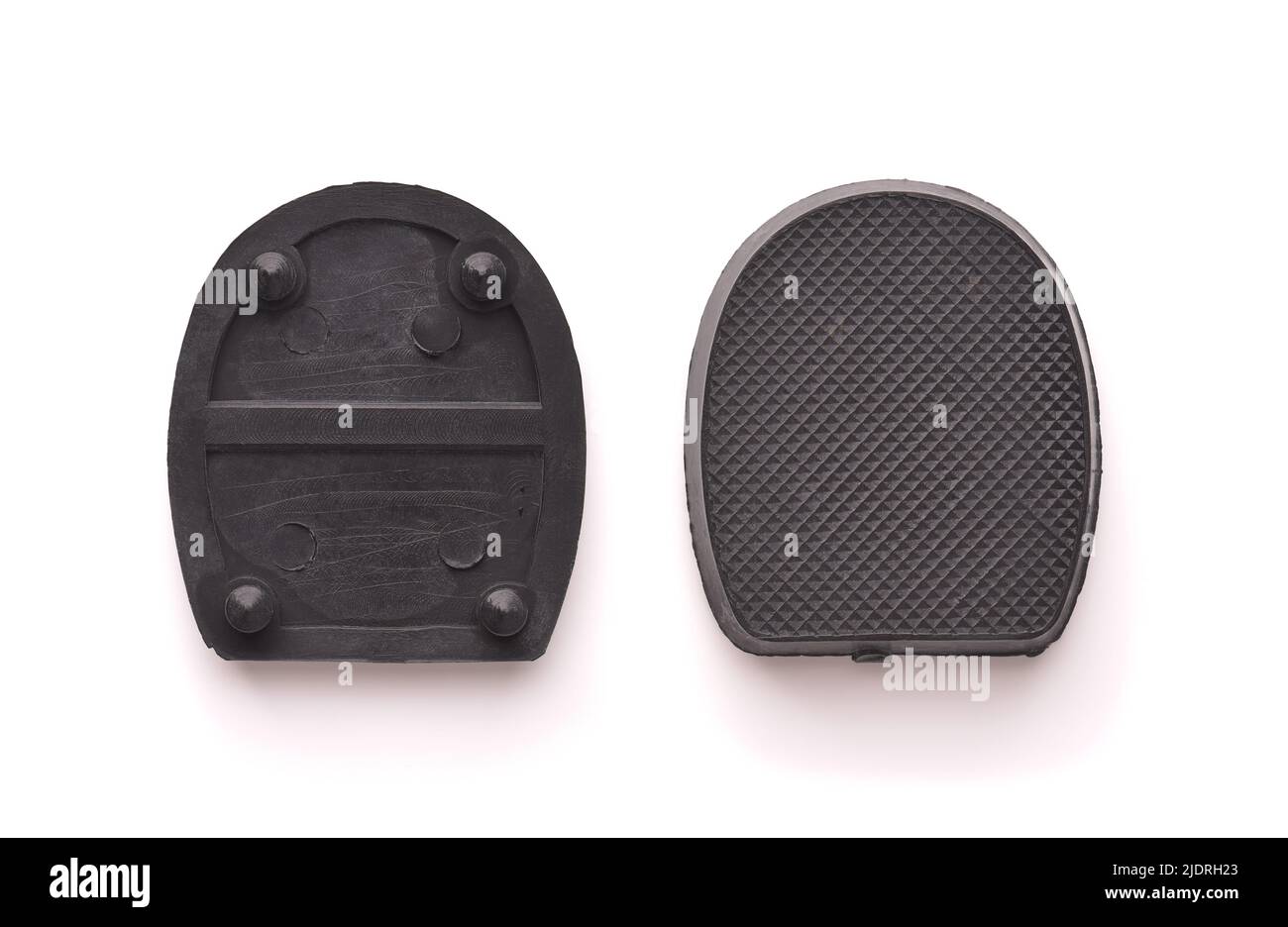 Top view of black replacement shoe heel pieces set isolated on white ...