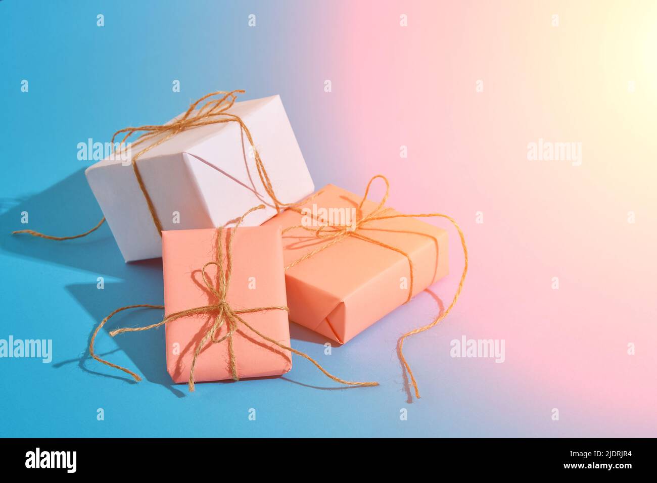 Craft paper wrapped present boxes craft rope bow ribbon with sha Stock ...