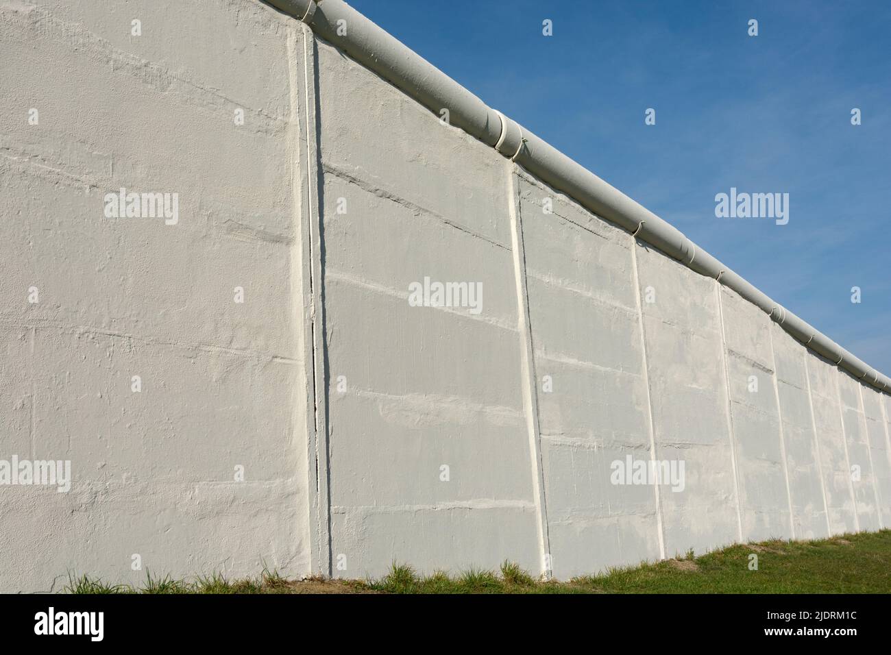 A boundary wall with sky in background Stock Photo - Alamy