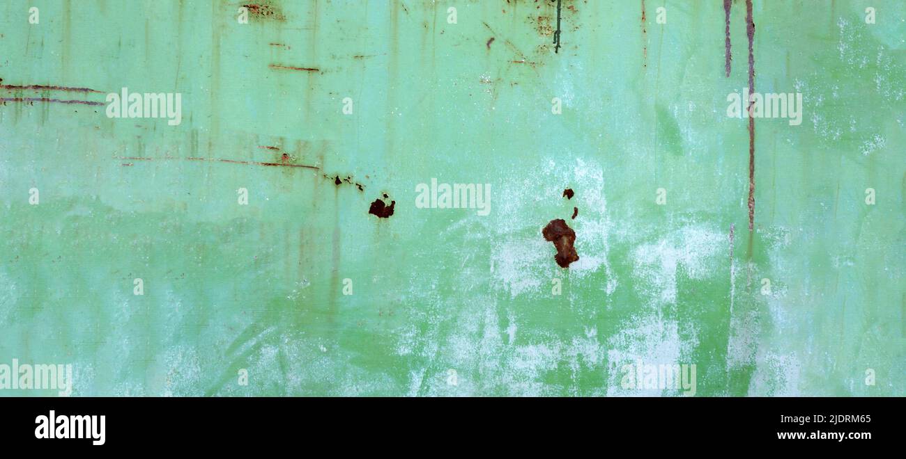 Texture of the old green paint is a rusty surface. Grunge background ...