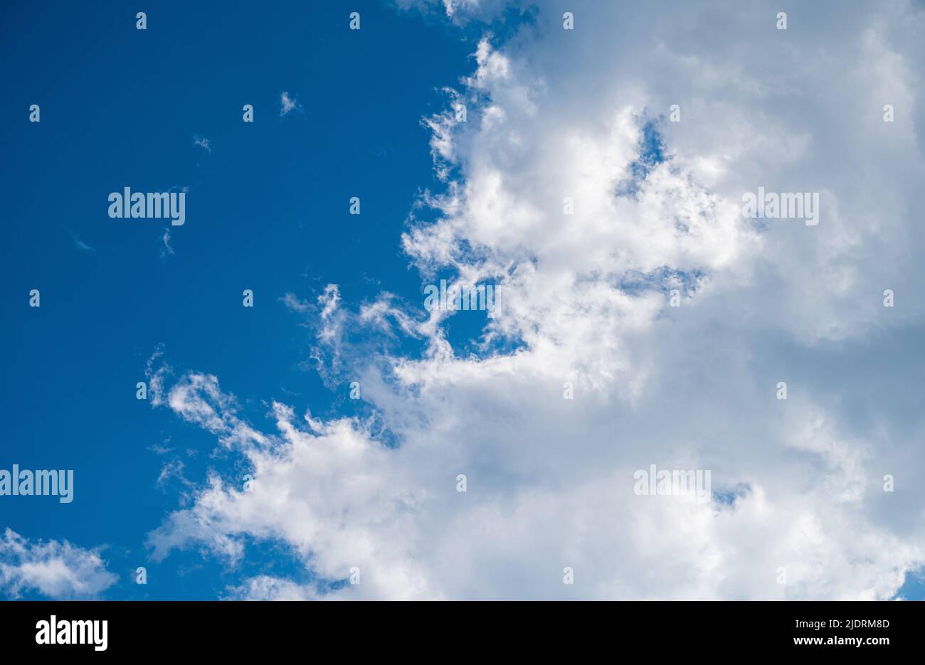 Dramatic blue sky with white clouds Stock Photo - Alamy