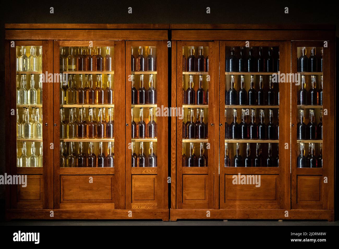 Different ages and colours of strong alcoholic apple drink calvados in ...