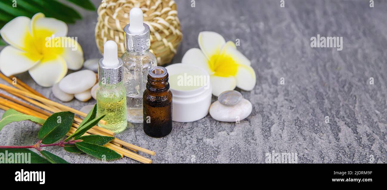 Background spa cosmetics and oils and herbs. Selective focus Stock ...