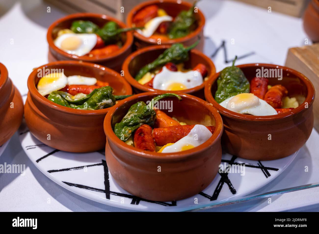 Typical snack of Basque Country and Navarre, pinchos or pinxtos served ...