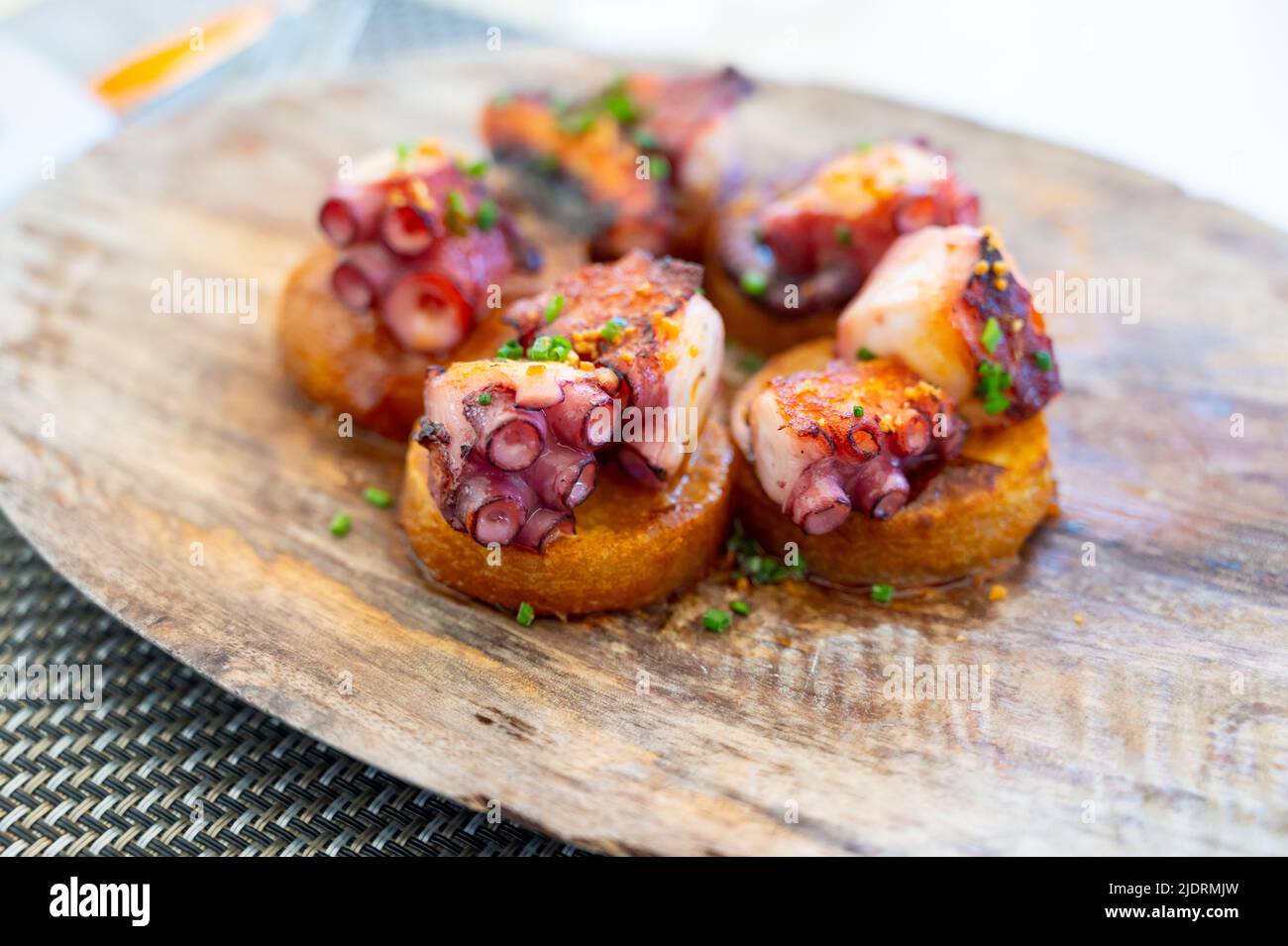 Spanish starter dish in fish restaurant in Getaria, grilled octopus ...